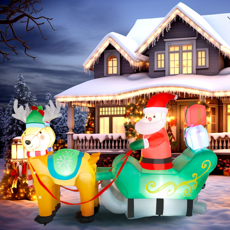 The Holiday Aisle® Santa Sleigh And Reindeer Inflatable | Wayfair